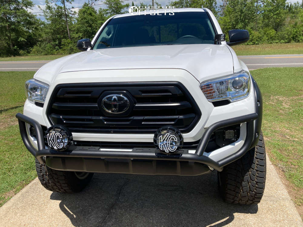 2019 Toyota Tacoma with 20x12 -44 Black Rhino Armory and 305/55R20 Toyo ...