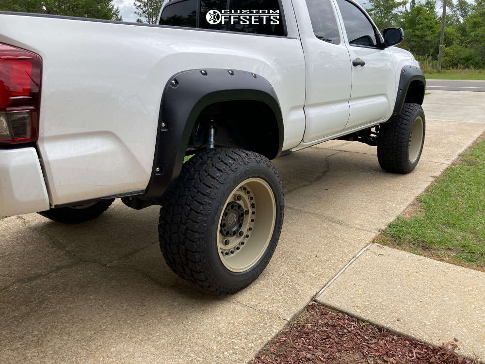 2019 Toyota Tacoma with 20x12 -44 Black Rhino Armory and 305/55R20 Toyo ...