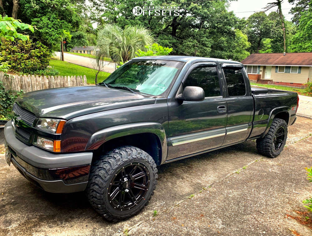 2003 Chevrolet Silverado 1500 with 20x10 -24 Helo He900 and 33/12.5R20 ...