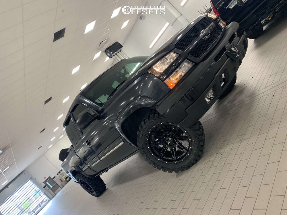 2003 Chevrolet Silverado 1500 with 20x10 -24 Helo He900 and 33/12.5R20 ...