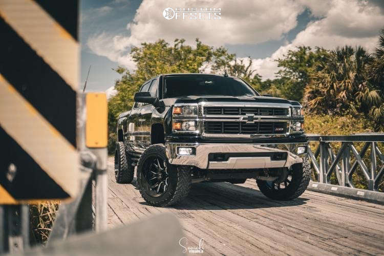 2015 Chevrolet Silverado 1500 with 22x12 -44 Hostile Rage and 35/12 ...