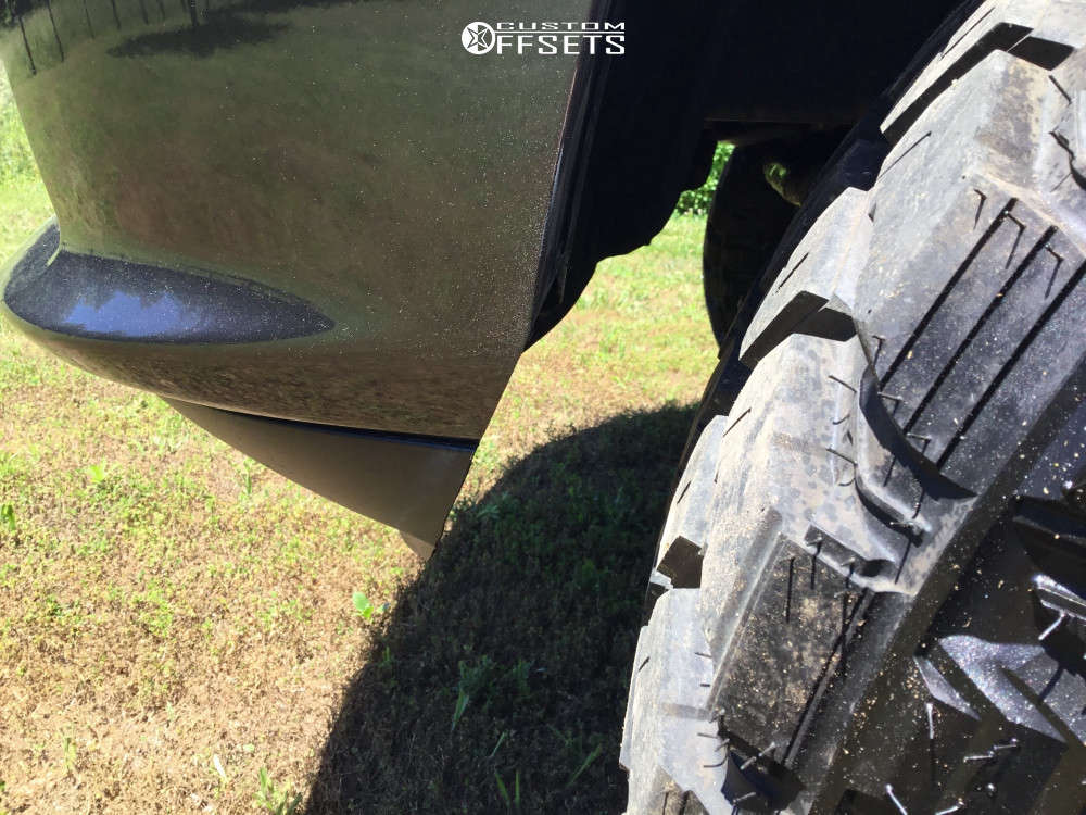 2016 Ram 1500 with 20x12 -44 V-Rock Recoil and 37/13.5R20 Maxxis Razr ...