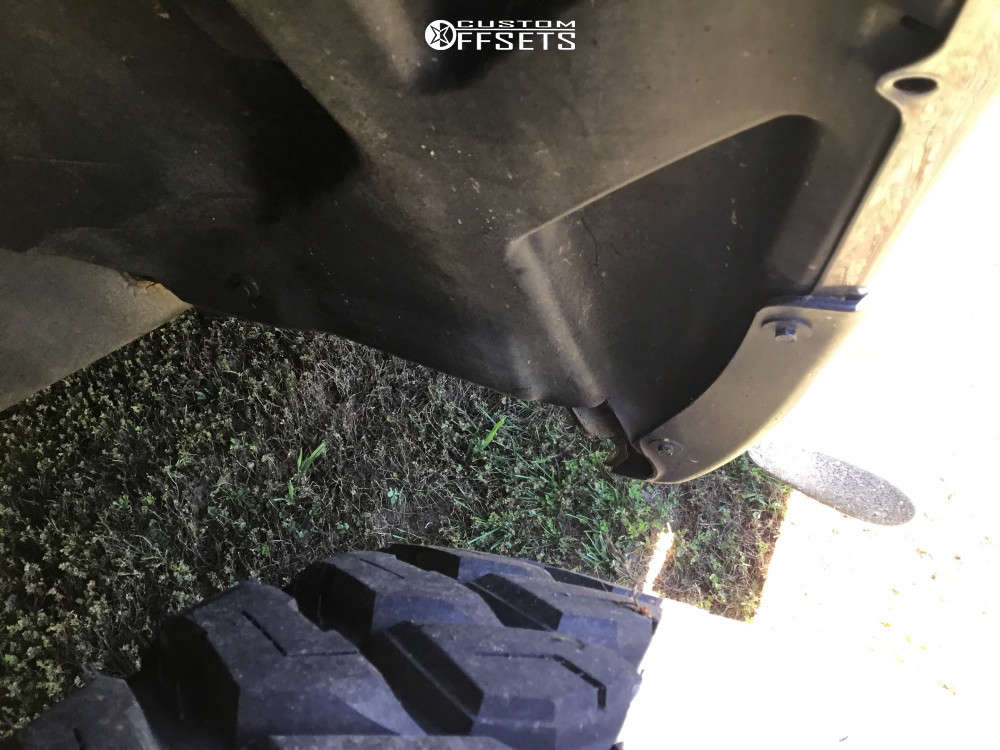 2016 Ram 1500 with 20x12 -44 V-Rock Recoil and 37/13.5R20 Maxxis Razr ...