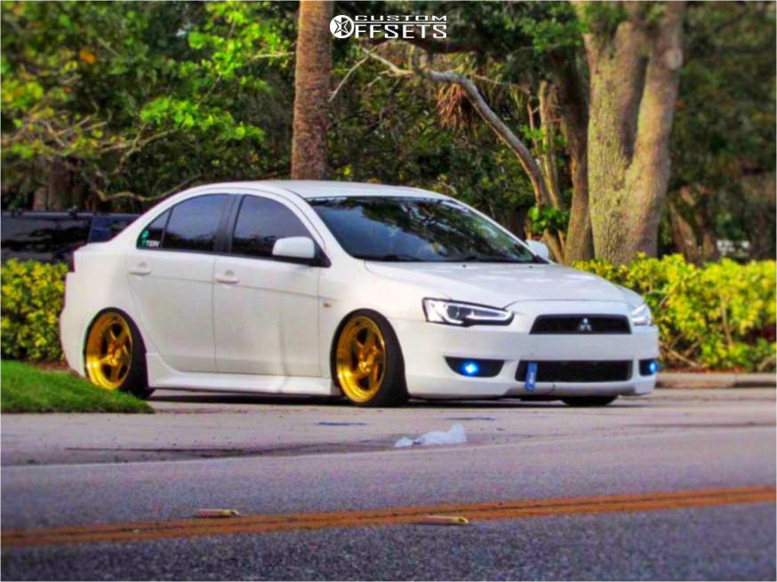 2011 Mitsubishi Lancer with 18x9.5 30 Aodhan Ah01 and 215/35R18 ...