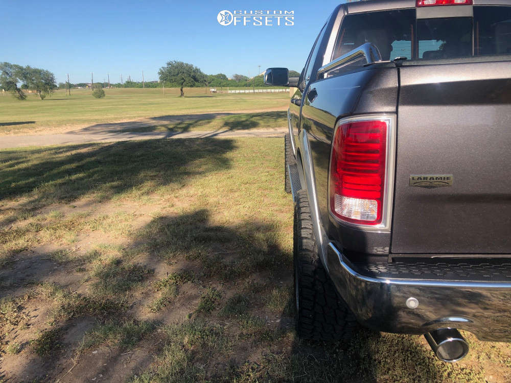 2017 Ram 1500 with 22x9 13 Borghini B19 and 35/12.5R22 Nitto Recon ...