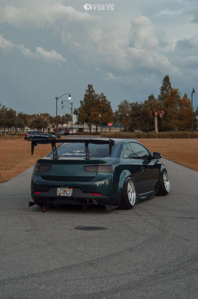 2010 Kia Forte Koup with 17x9.5 35 SSR Sp1 and 205/40R17 Cosmo Mucho ...