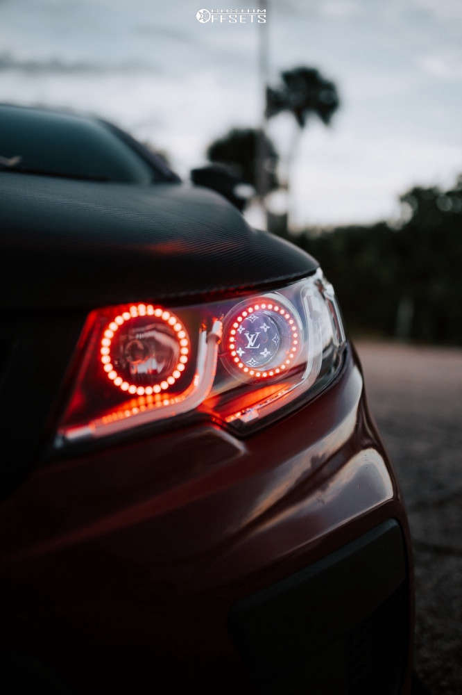 2010 Kia Forte Koup with 17x9.5 35 SSR Sp1 and 205/40R17 Cosmo Mucho ...