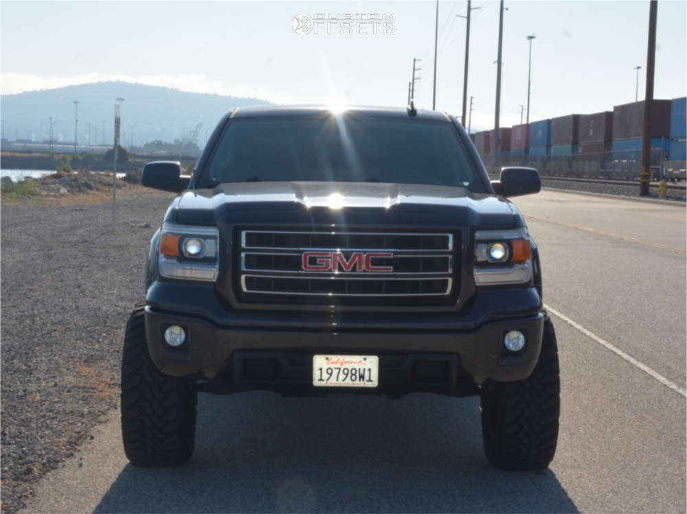2015 GMC Sierra 1500 with 20x10 -24 Method Mr606 and 35/12.5R20 Toyo ...