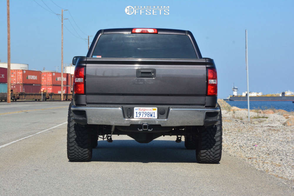 2015 GMC Sierra 1500 with 20x10 -24 Method Mr606 and 35/12.5R20 Toyo ...