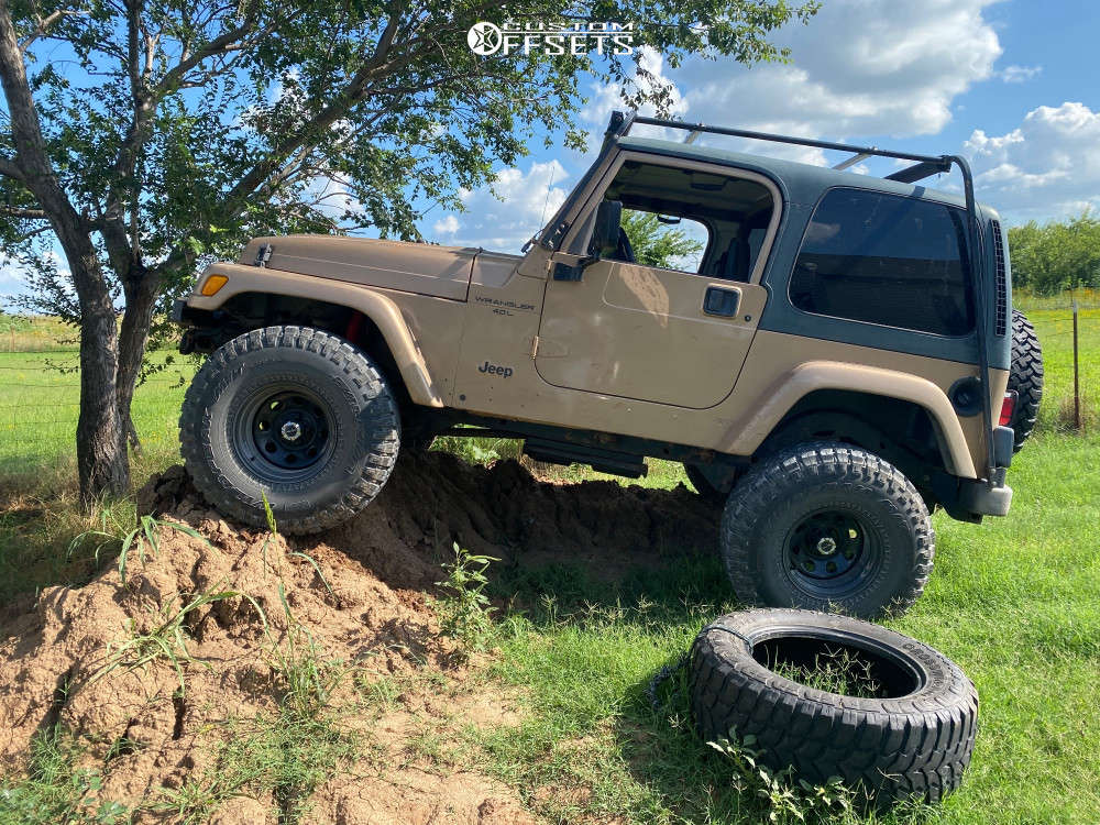 2000 Jeep TJ with 15x10 -39 Vision Soft 8 and 35/12.5R15 Falken ...