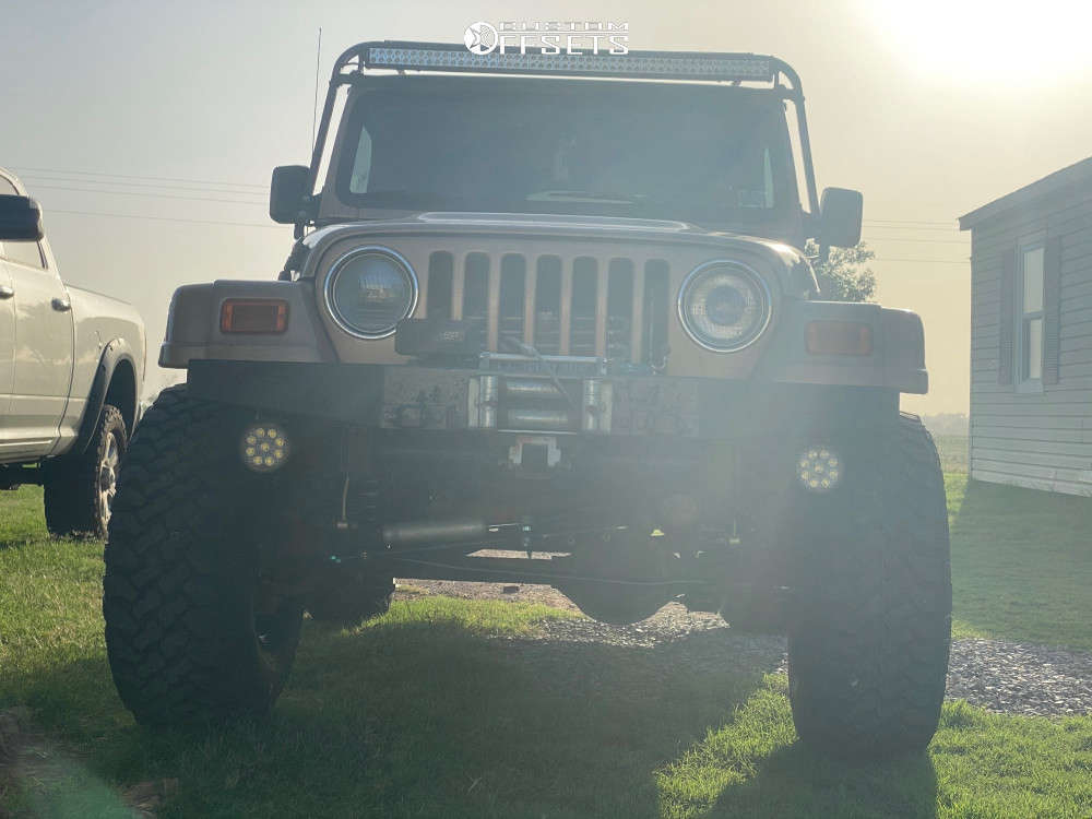 2000 Jeep TJ with 15x10 -39 Vision Soft 8 and 35/12.5R15 Falken ...