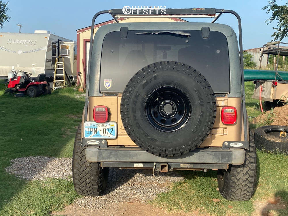 2000 Jeep TJ with 15x10 -39 Vision Soft 8 and 35/12.5R15 Falken ...