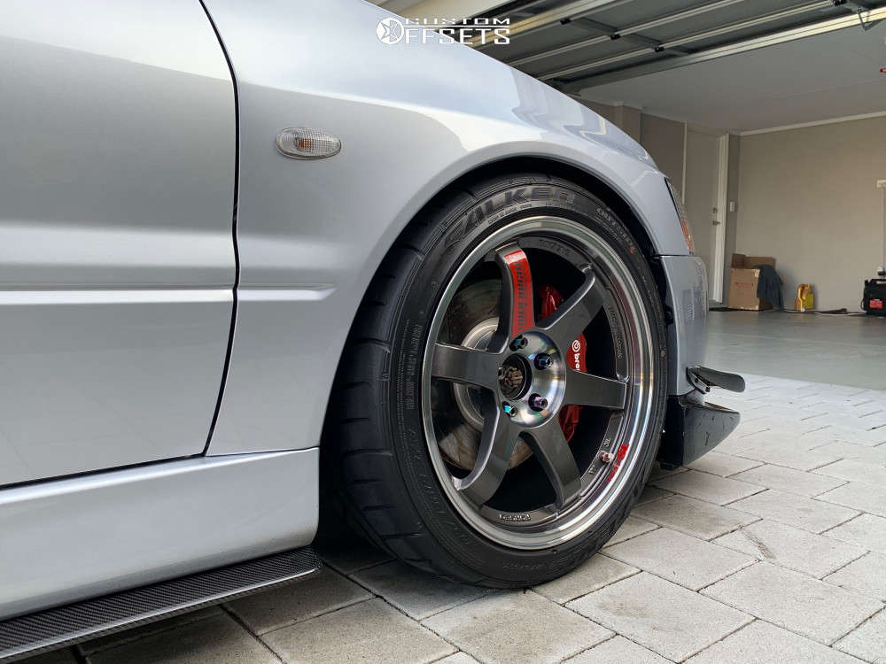 2006 Mitsubishi Lancer with 18x9.5 22 Volk Te37sl and 265/35R18 Falken ...