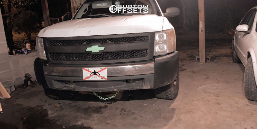 2011 Chevrolet Silverado 1500 with 18x12 -44 Tuff T05 and 33/12.5R18 ...