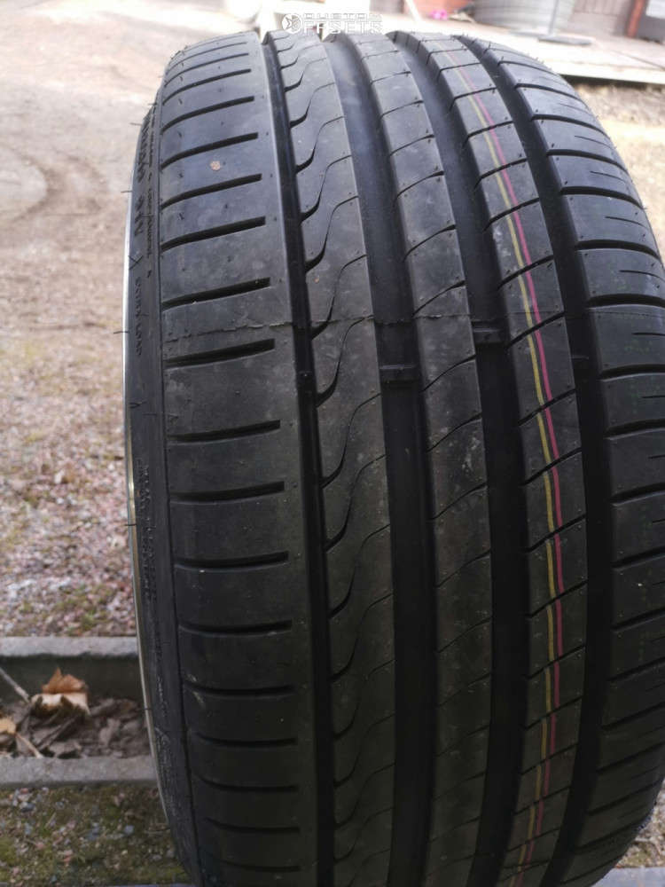 2001 Saab 9-5 with 19x8.5 40 Schmidt Cf Line and 215/30R19 Minerva F205 ...