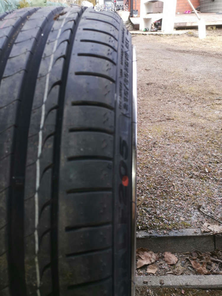 2001 Saab 9-5 with 19x8.5 40 Schmidt Cf Line and 215/30R19 Minerva F205 ...