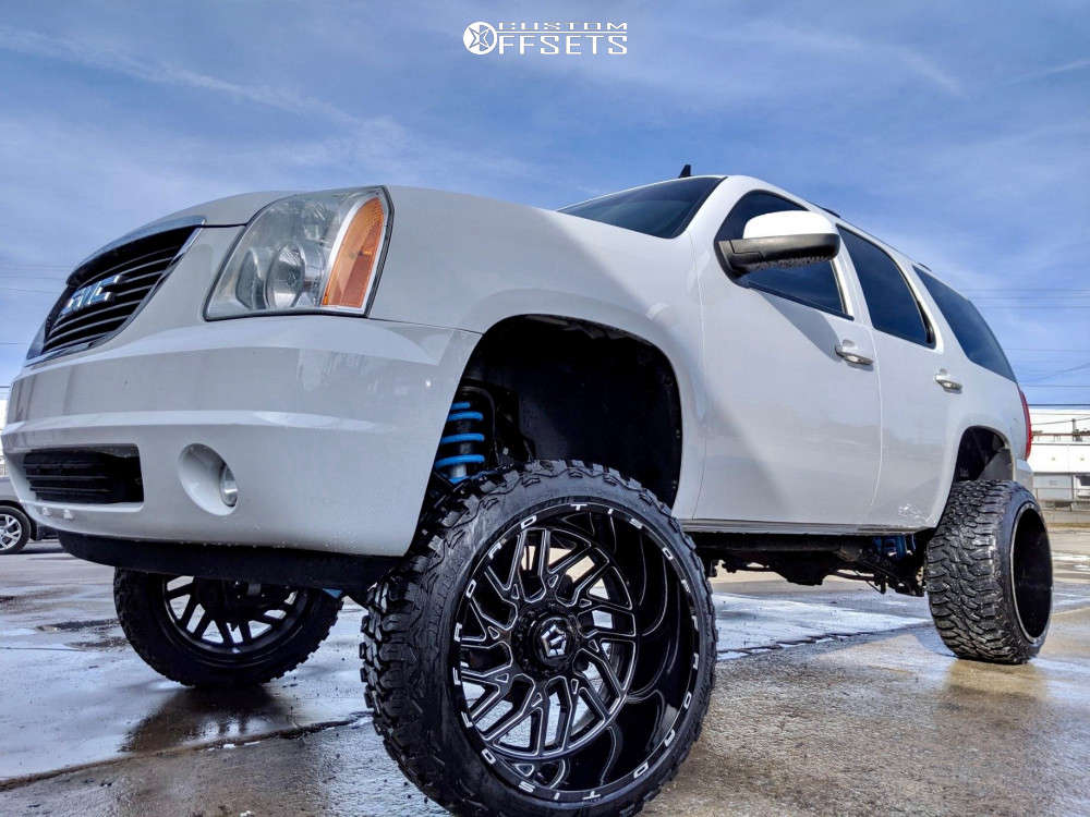 2010 GMC Yukon with 24x14 -76 TIS 544BM and 35/12.5R24 Haida Mud Champ ...