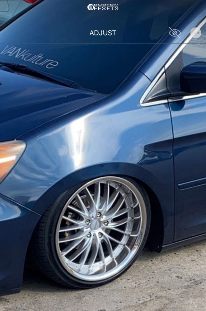 2010 Honda Odyssey with 20x10 40 Ravetti M5 and 245/35R20 Lionhart Lx ...