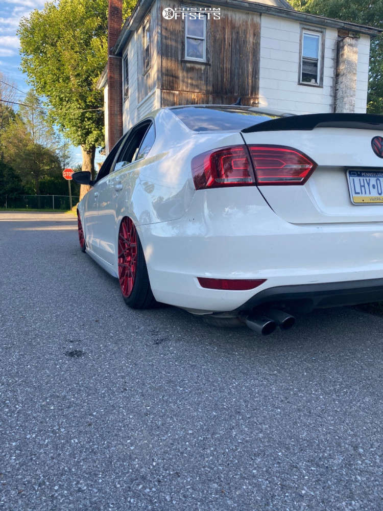 2014 Volkswagen Jetta with 18x8.5 45 Rotiform Blq and 215/25R18 Hankook ...
