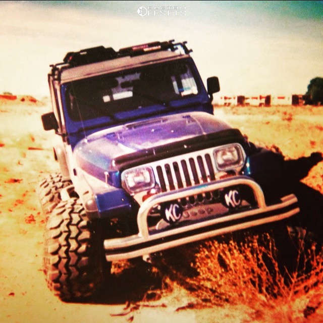 1994 Jeep Wrangler with 15x18 -44 Weld Racing Classic and 33/12.5R15 ...