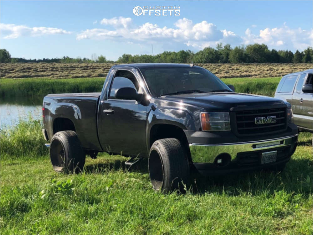 2010 GMC Sierra 1500 with 22x14 -76 American Truxx Spider and 33/12 ...
