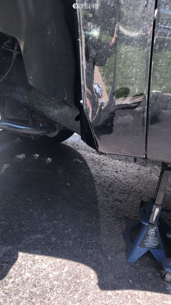 2010 GMC Sierra 1500 with 22x14 -76 American Truxx Spider and 33/12 ...