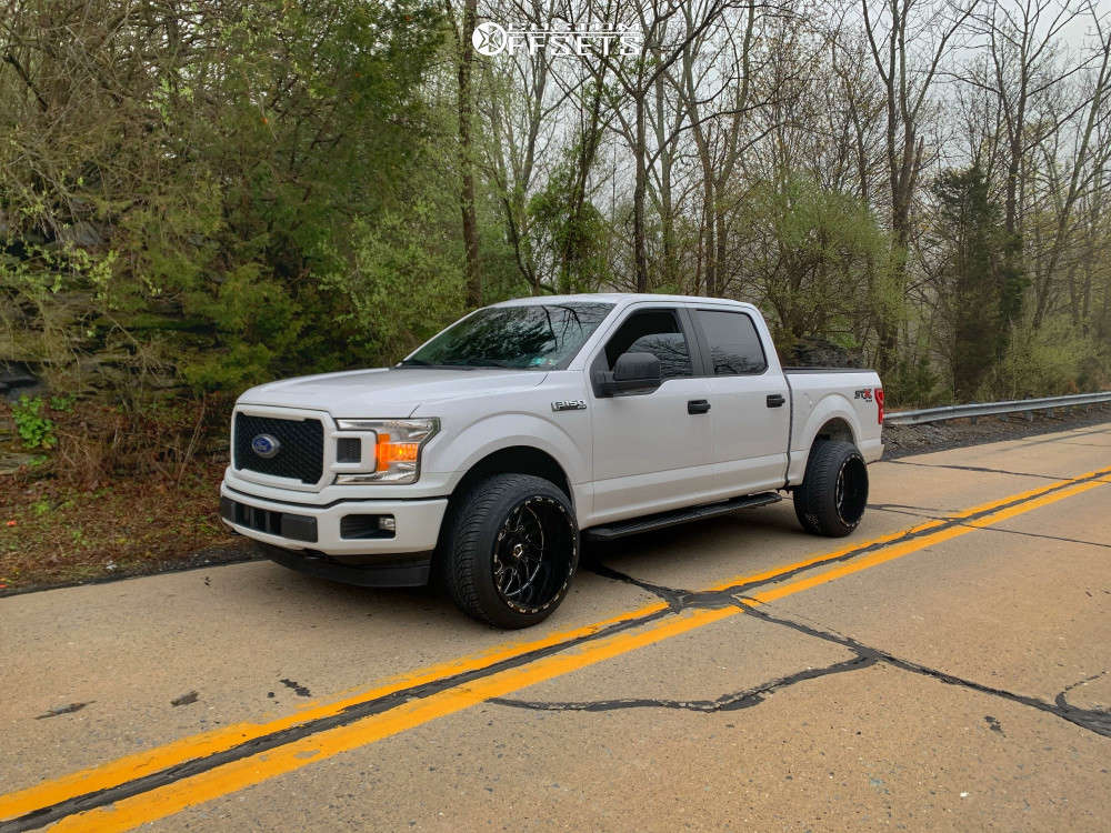 2019 Ford F-150 with 22x14 -76 TIS 544BM and 305/40R22 Atturo Az800 and ...