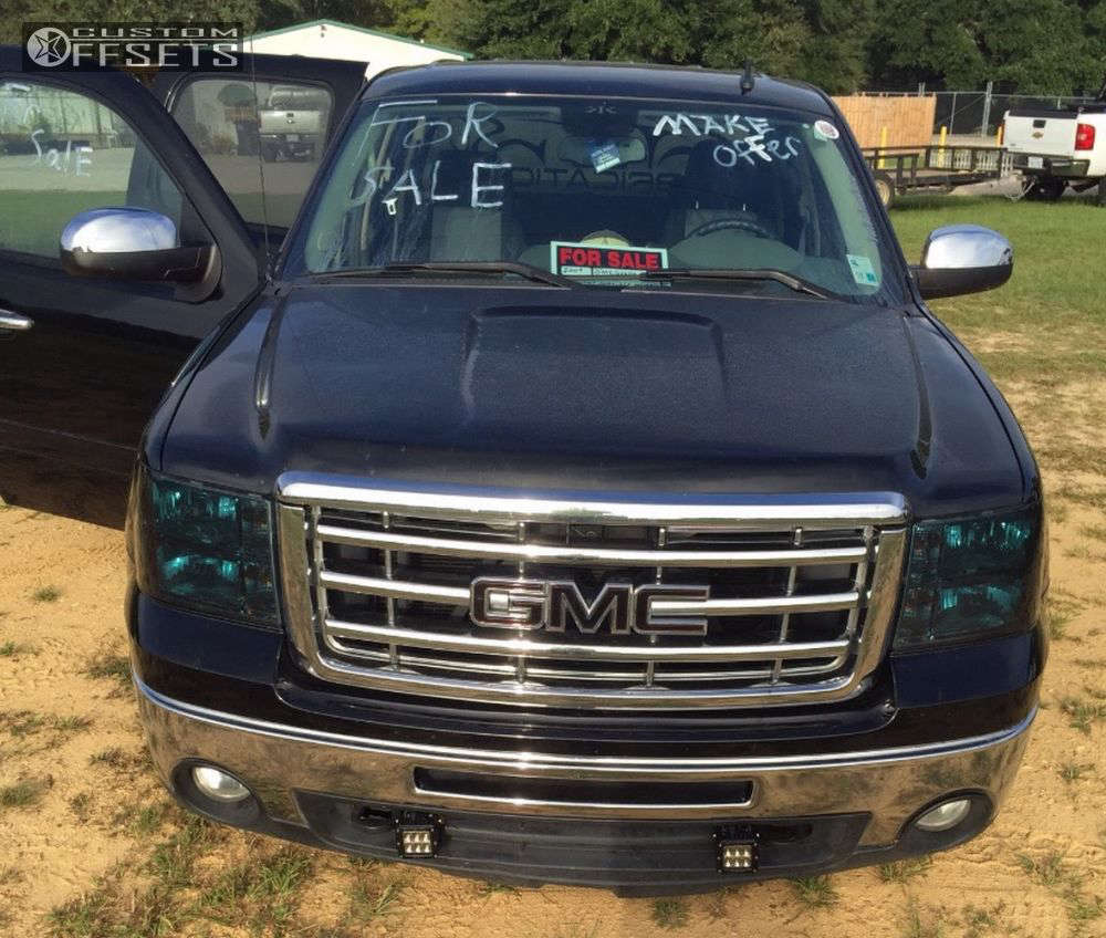 2009 GMC Sierra 1500 with 26x9.5 38 Helo HE and 275/25R26 Wingate LTX A ...