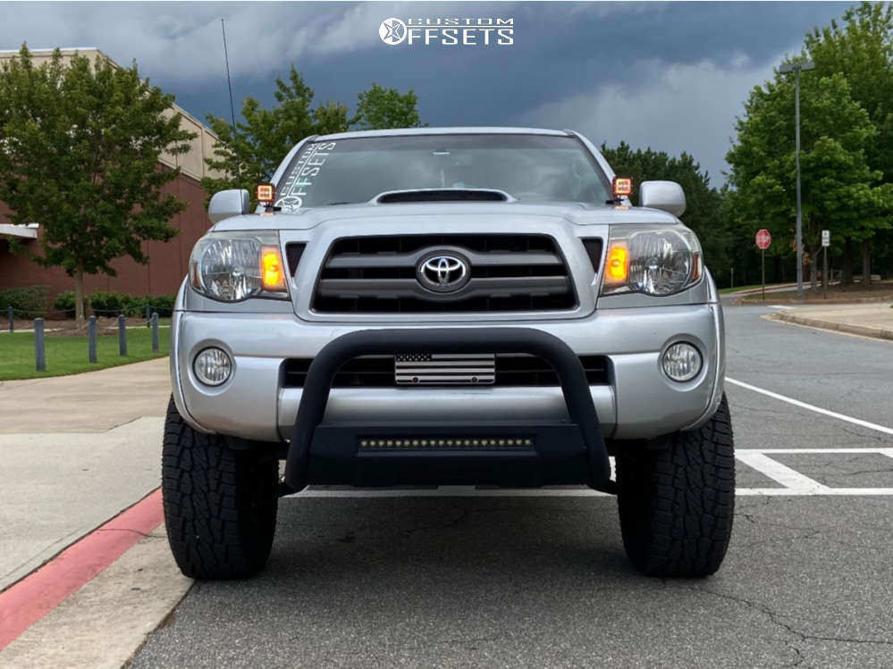 2010 Toyota Tacoma with 17x9 -6 Pro Comp Series 40 and 285/70R17 Pro ...