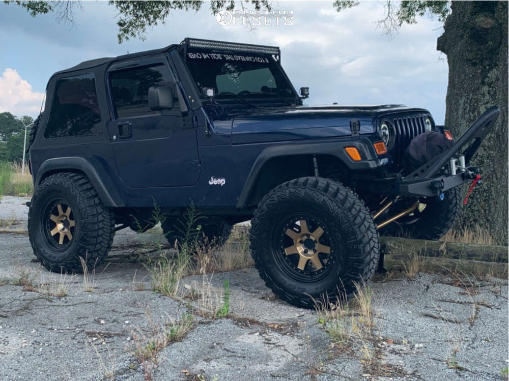 2006 Jeep TJ with 17x9 -6 Mayhem Prodigy and 35/12.5R17 Goodyear ...