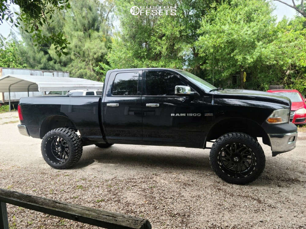 2012 Ram 1500 with 22x12 -44 TIS 544BM and 35/12.5R22 RBP Repulsor Mt ...