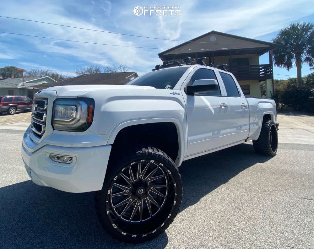 2018 GMC Sierra 1500 with 24x12 -44 TIS 547BM and 33/12.5R24 Comforser ...