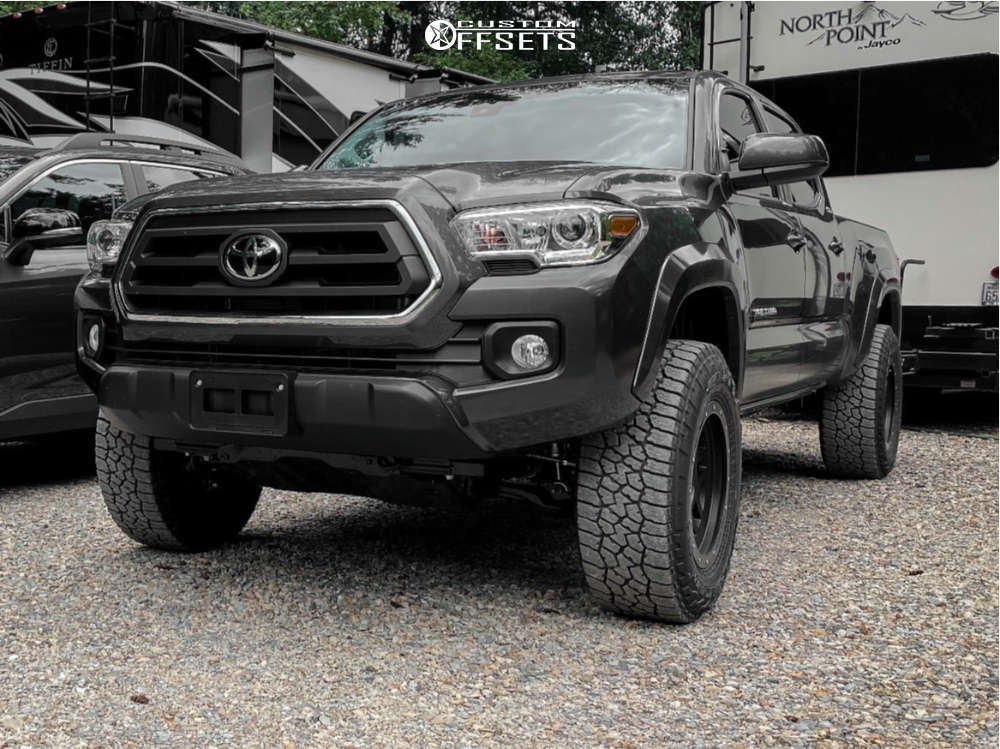 2020 Toyota Tacoma with 17x9 -6 Pro Comp Series 41 and 265/70R17 Falken ...