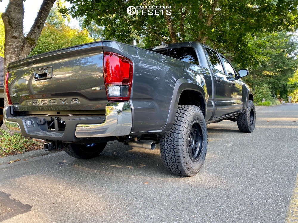 2020 Toyota Tacoma with 17x9 -6 Pro Comp Series 41 and 265/70R17 Falken ...