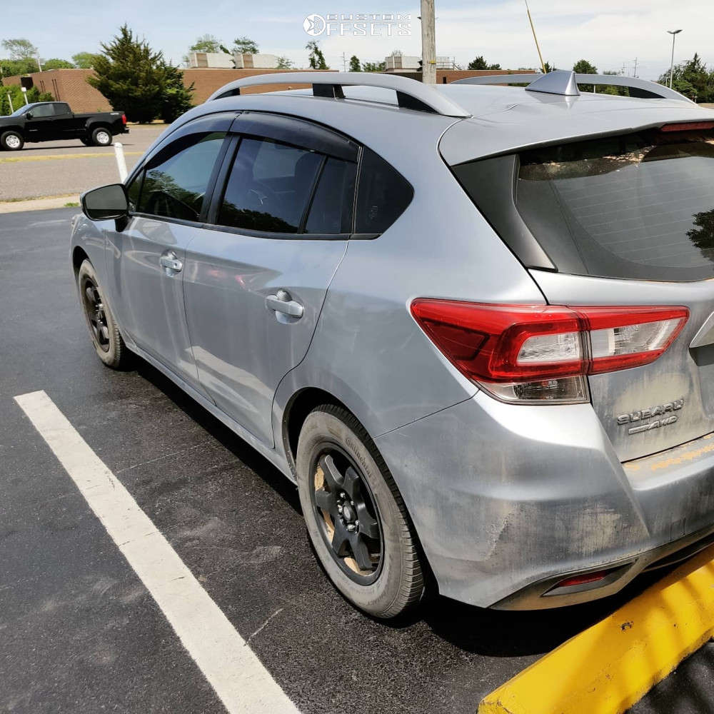 2019 Subaru Impreza with 15x7 38 Focal X and 195/65R15 Continental ...