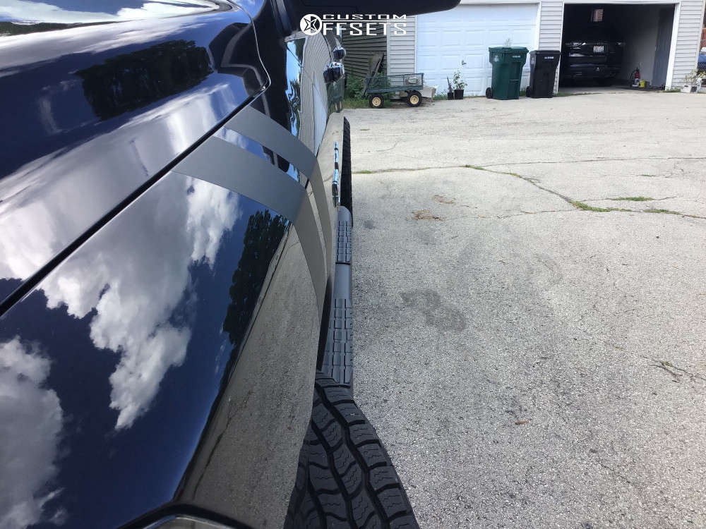 2018 Ram 2500 with 20x9 18 DX4 7s and 275/65R20 Cooper Discoverer At3 ...