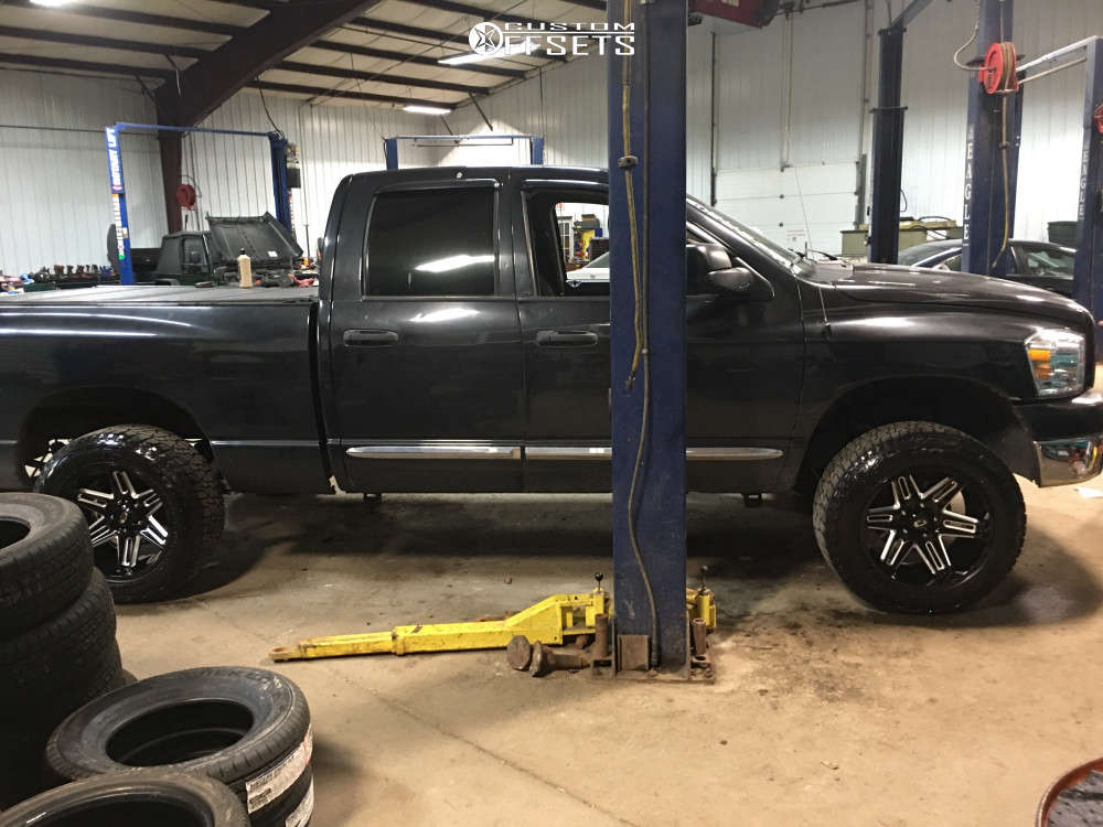 2007 Dodge Ram 1500 with 20x10 -25 Vision Razor and 275/60R20 Falken ...