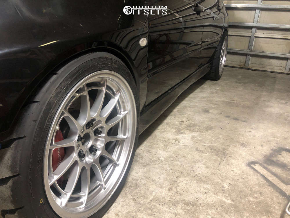 2003 Mitsubishi Lancer with 18x9.5 27 Enkei Nt03 and 255/45R18 Toyo ...