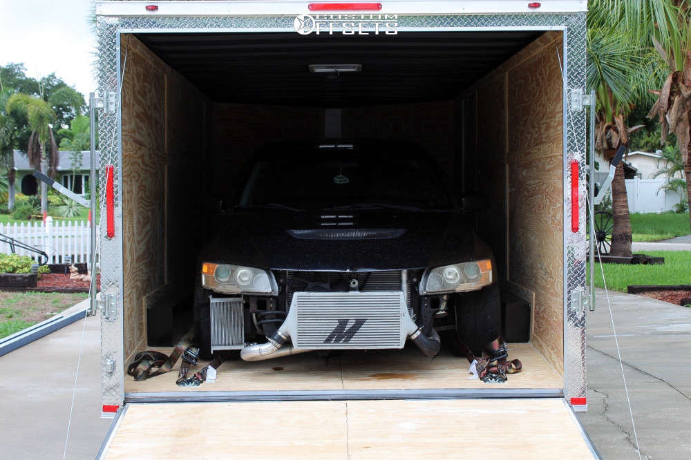 2003 Mitsubishi Lancer with 18x9.5 27 Enkei Nt03 and 255/45R18 Toyo ...