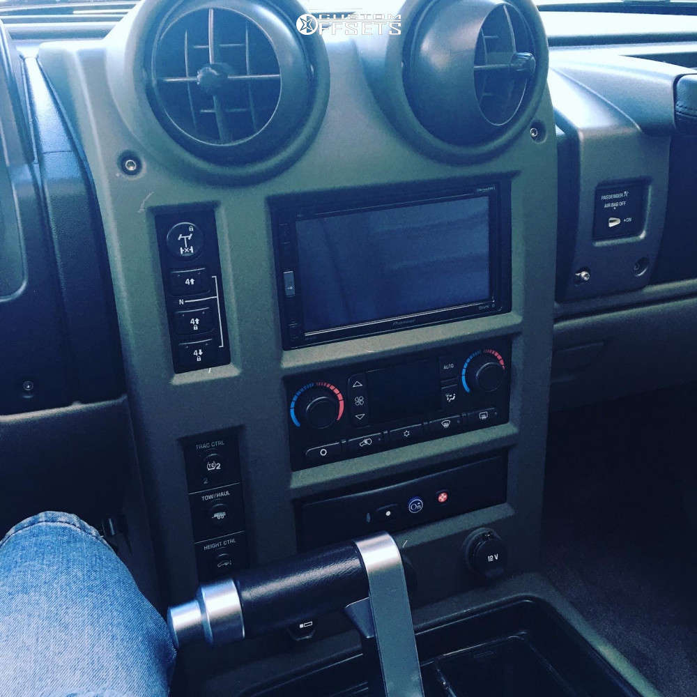 2003 Hummer H2 with 22x14 -76 American Truxx AT163 and 33/14R22 Patriot ...