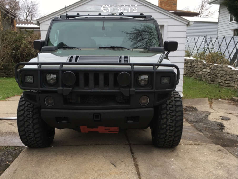 2003 Hummer H2 with 22x14 -76 American Truxx AT163 and 33/14R22 Patriot ...