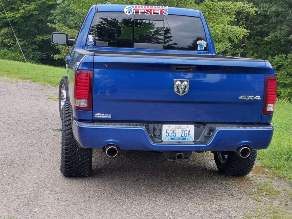 2014 Ram 1500 with 20x10 -25 Vision Razor and 33/12.5R20 Atturo Trail ...