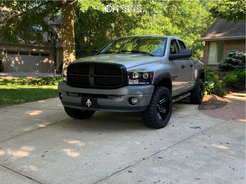 2006 Dodge Ram 1500 with 20x10 -25 Vision Razor and 33/12.5R20 Yokohama ...