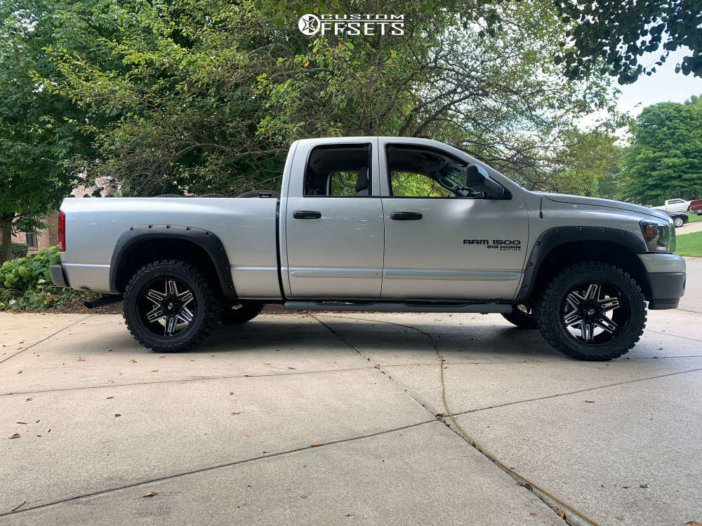 2006 Dodge Ram 1500 with 20x10 -25 Vision Razor and 33/12.5R20 Yokohama ...