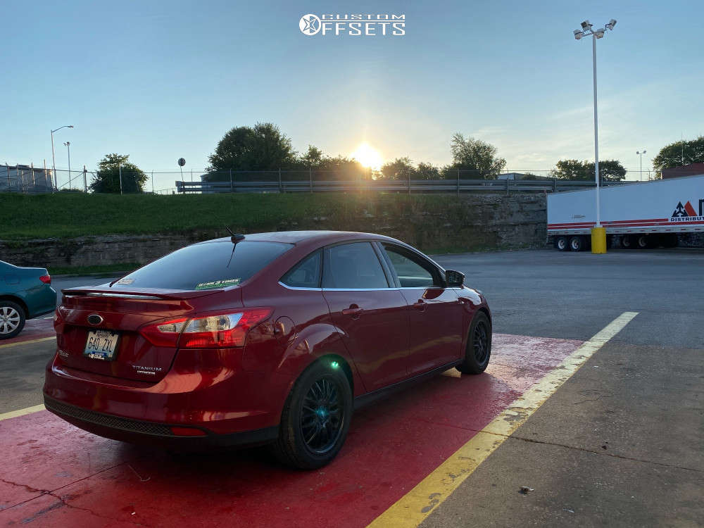 2013 Ford Focus with 17x7.5 40 Voxx Masi and 215/50R17 Black Lion ...