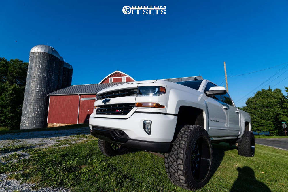 2016 Chevrolet Silverado 1500 with 22x12 -44 Hostile Fury and 35/12 ...