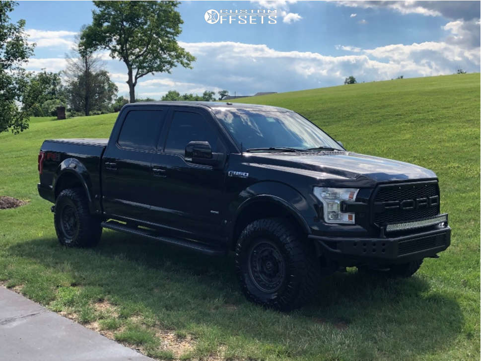 2015 Ford F-150 with 17x8.5 0 Black Rhino Armory and 35/7.5R17 Nitto ...