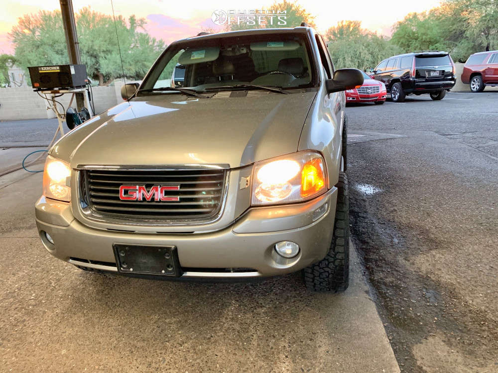 2003 GMC Envoy with 20x9 0 Anthem Off-Road Avenger and 32/10.5R20 Toyo ...