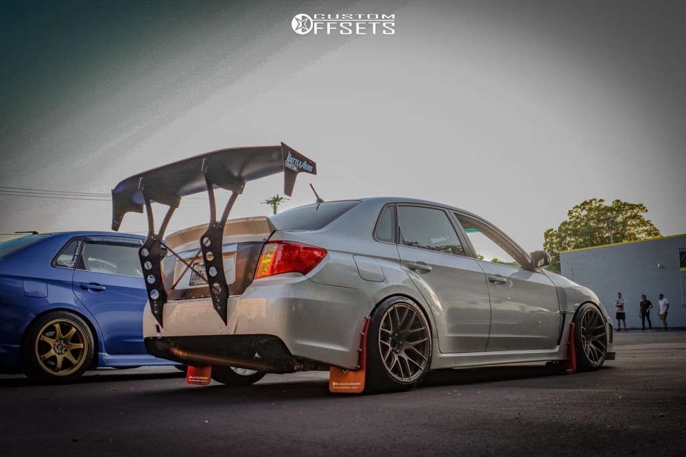 2011 Subaru Impreza with 18x9.75 20 XXR 530 and 255/35R18 Federal Evolution St-1 and Coilovers ...