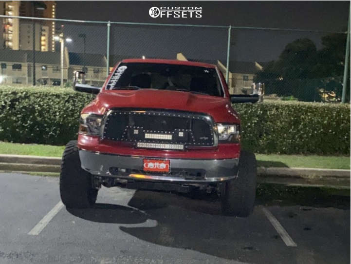 2010 Dodge Ram 1500 with 24x14 -76 RBP 71r and 35/13.5R24 AMP Mud ...